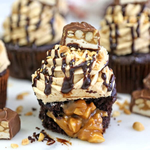 Snickers Cupcakes with Peanut Caramel Filling - SugarHero